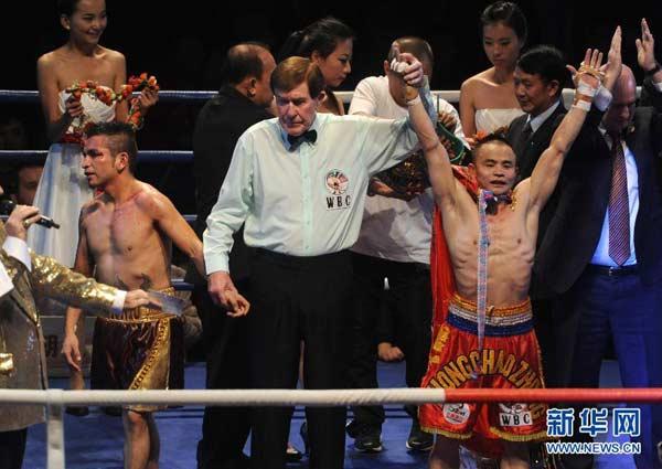 Chinese boxing star tops Thai challenger to defend title - Headlines ...