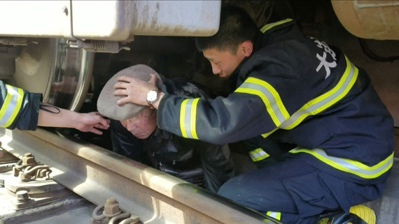 Man, 83, miraculously survives being run over by train in NE China