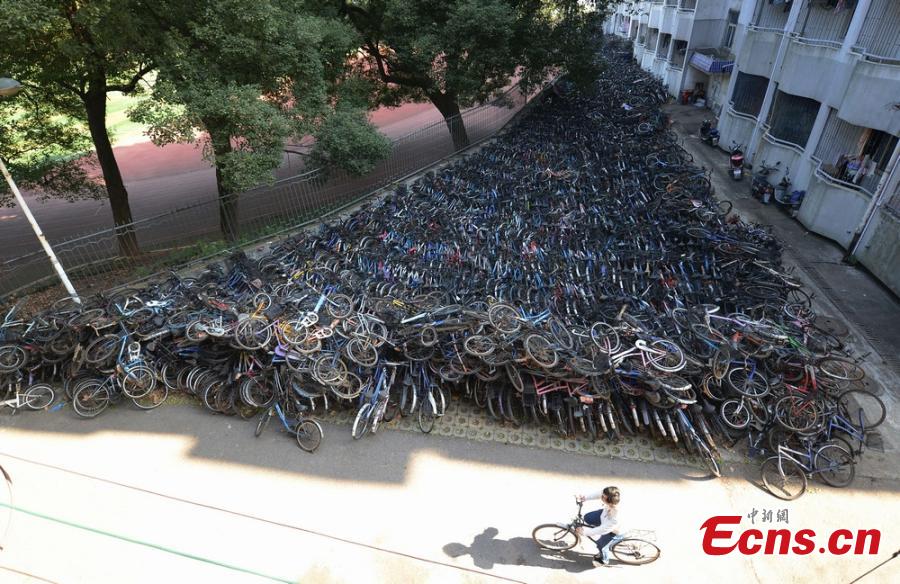'Bicycle graveyard' seen in Hunan university (1/6) - Headlines ...