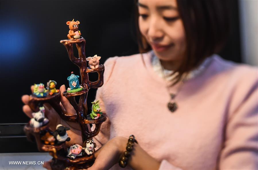 Dough modelling maker combines traditional Chinese skill with lovely ...