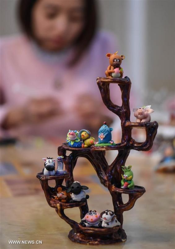 Dough modelling maker combines traditional Chinese skill with lovely ...