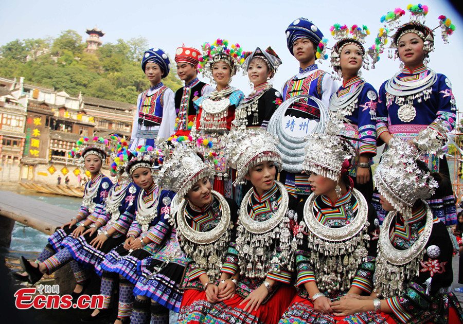 Ethnic minority costume show held at Fenghuang Ancient Town in Hunan (1 ...