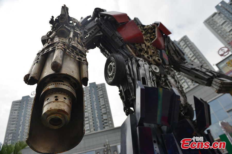'Transformer' formed with second hand car parts displayed in Chengdu (1 ...