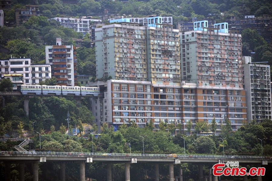 Light rail passes through building in Chongqing (6/6) - Headlines ...